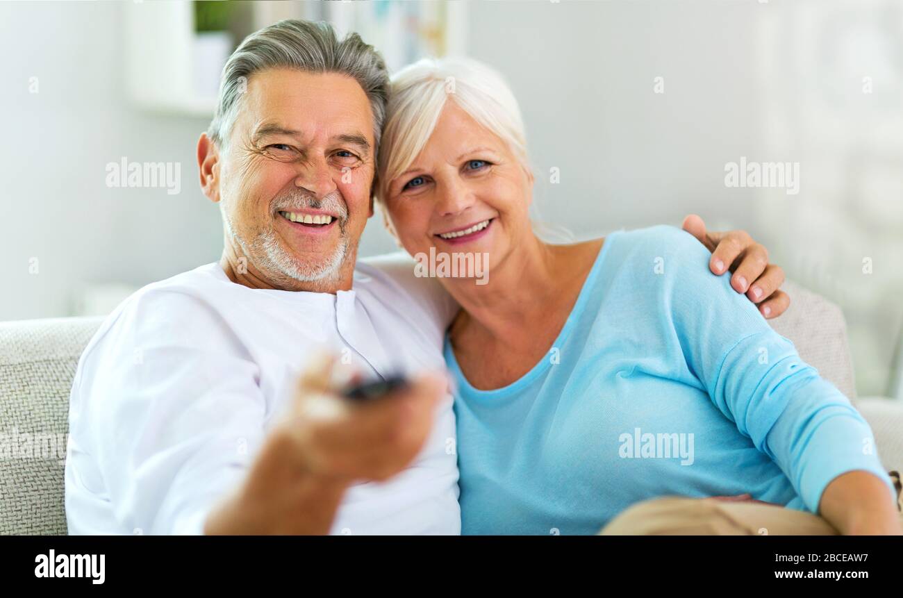 Mature woman tv remote control hi-res stock photography and images - Alamy