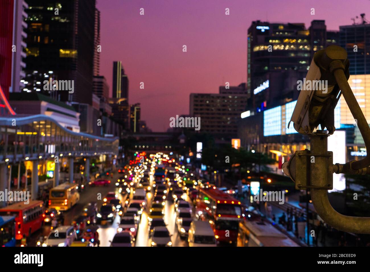 Blurred footage. Traffic jam on a wide street. Blurry brake lights ...
