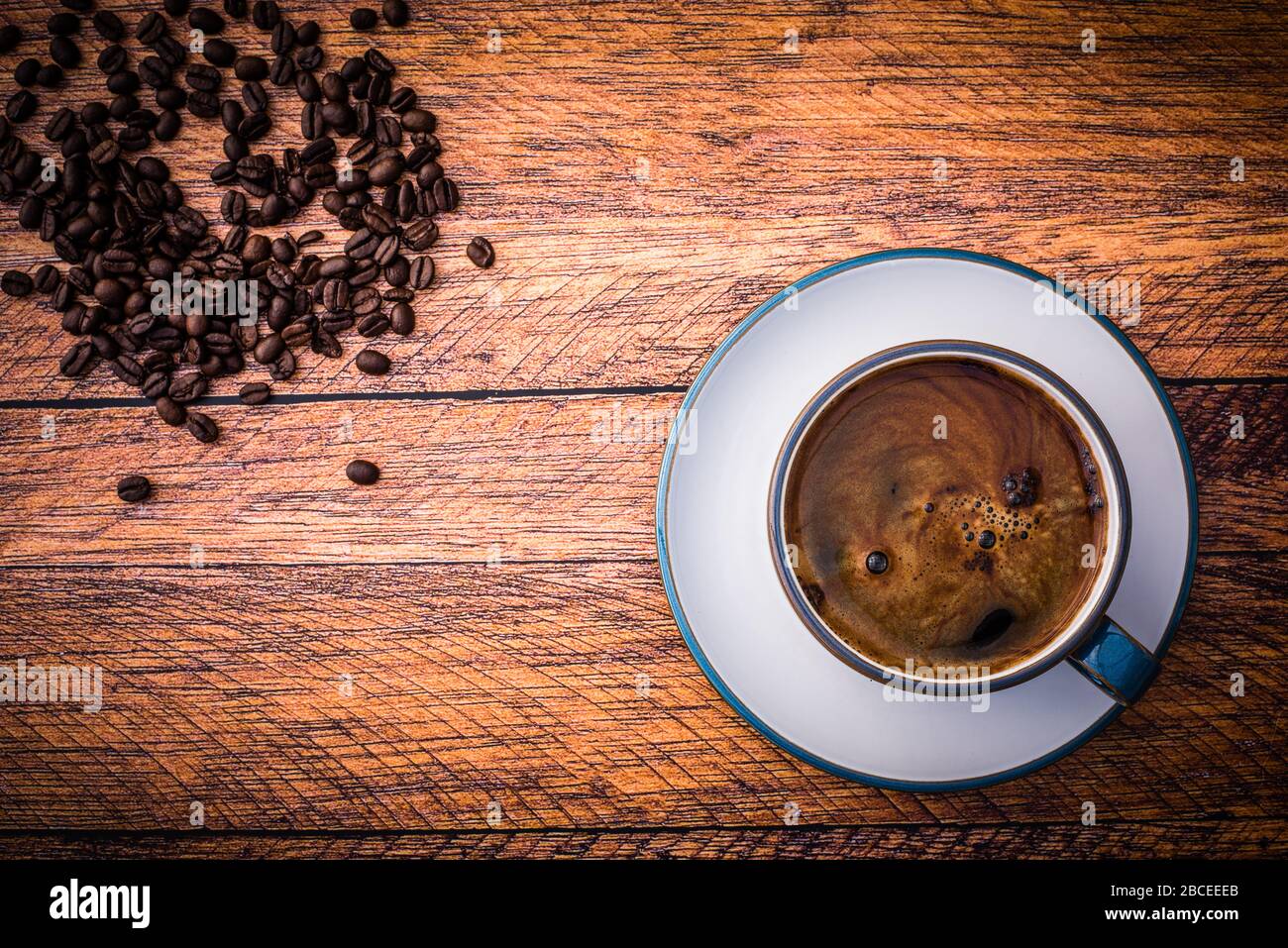 Flat Lay - Coffee & coffee beans in cup and saucer Stock Photo - Alamy