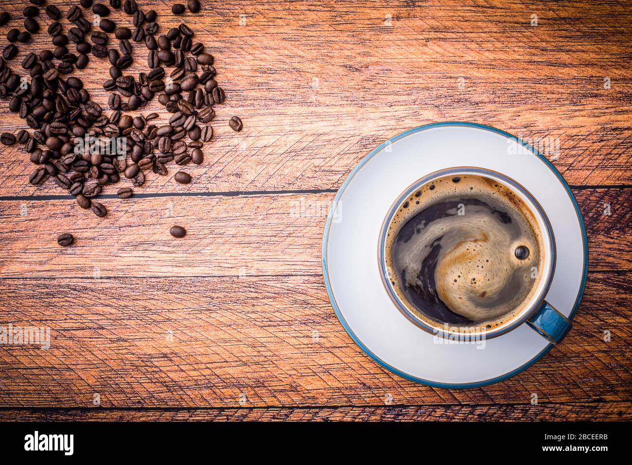 Flat Lay - Coffee & coffee beans in cup and saucer Stock Photo - Alamy