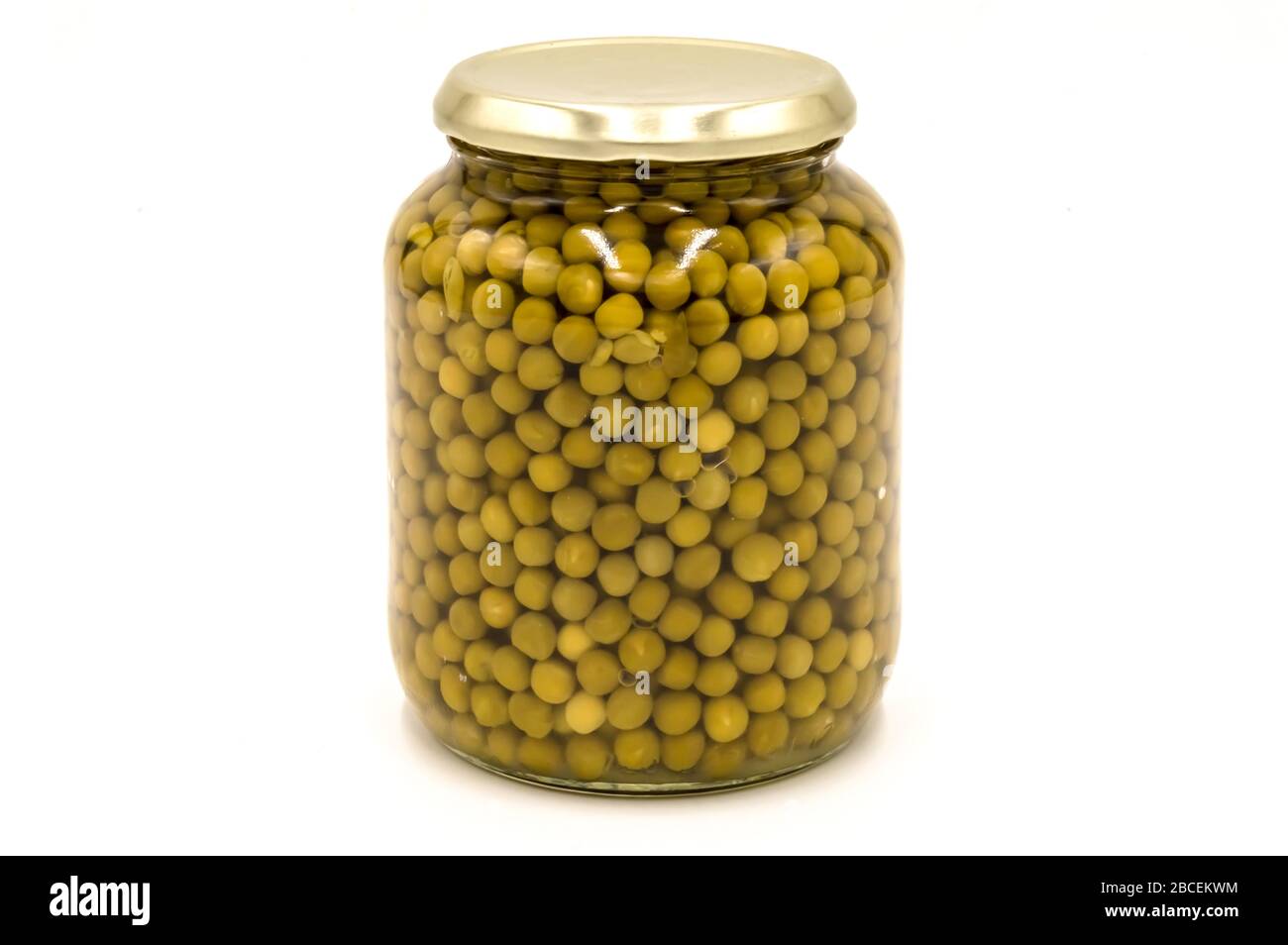 Green peas in a glass jar isolated on a white background Stock Photo ...