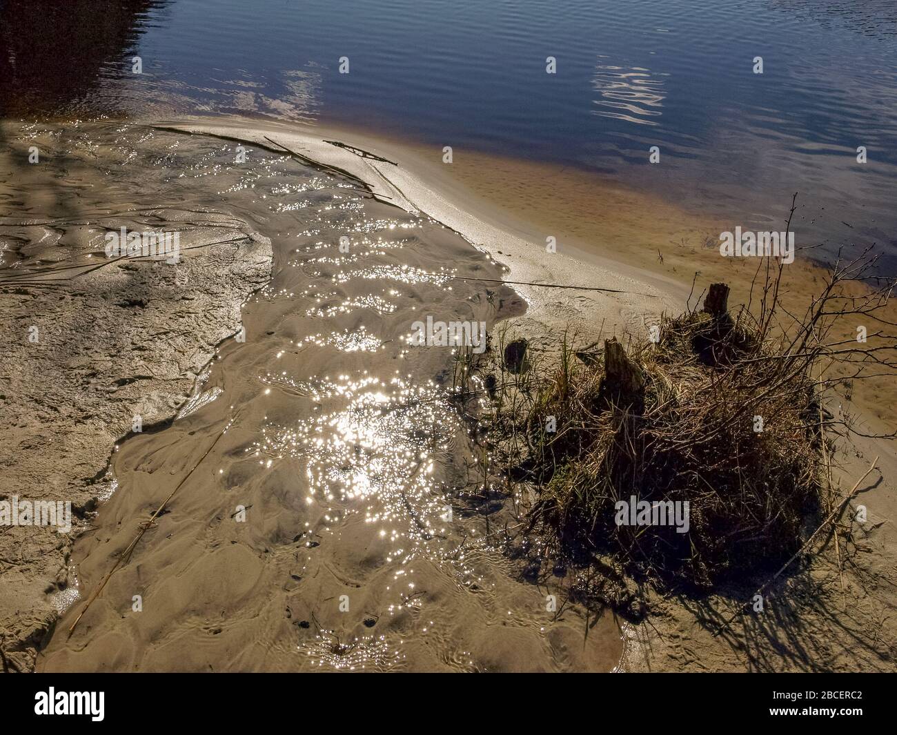 colorful abstract picture where spring water connects with lake water ...