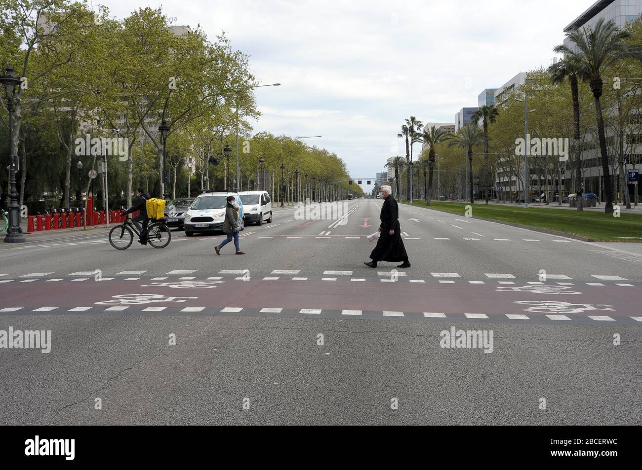 religious priest crossing diagonal avenue, Barcelona, Spain Stock Photo ...