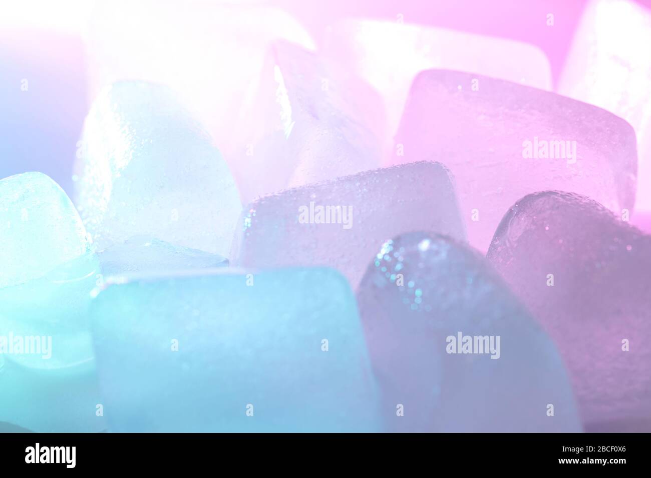 Close up of clean ice cubes on blue and purple light background Stock ...