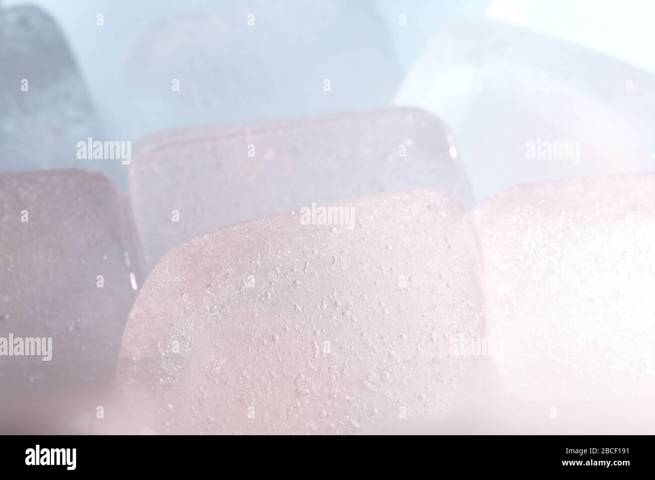 Melting ice cubes macro close up view. Icy background Stock Photo - Alamy