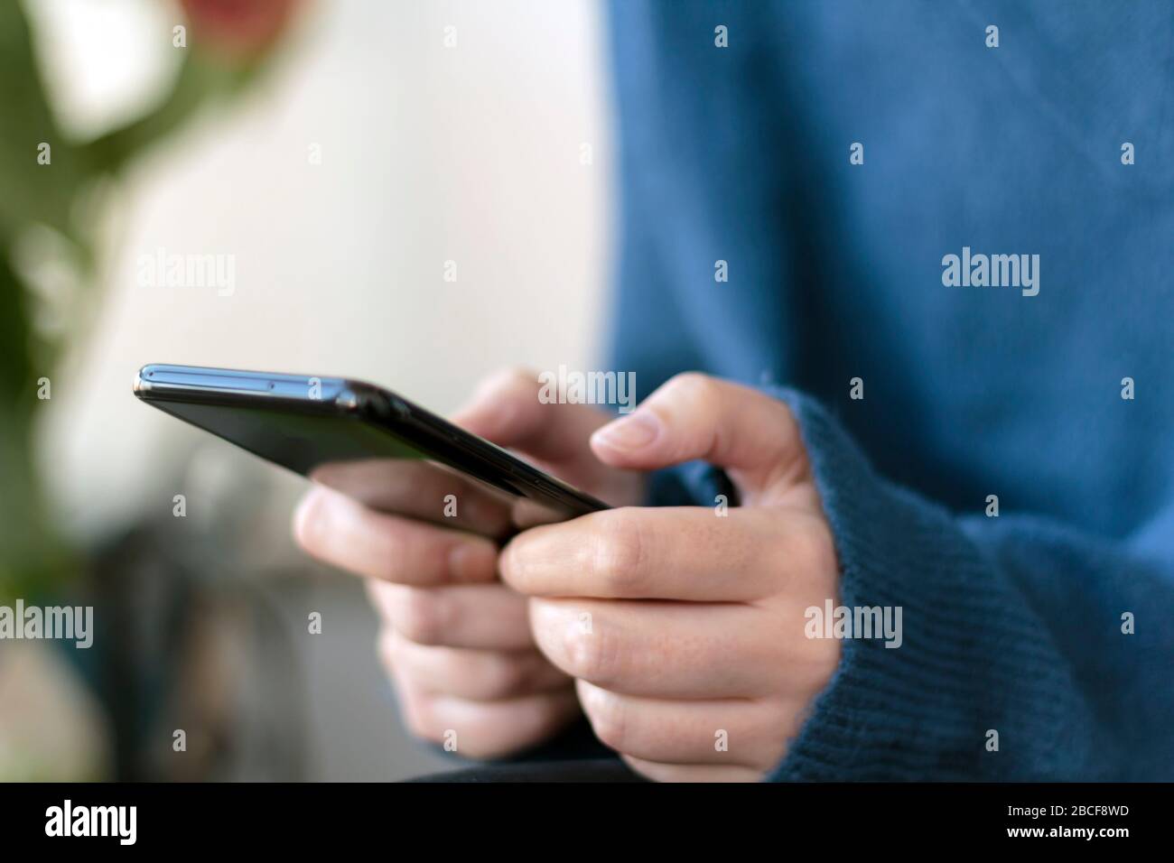 Using smartphone hands connecting digital hi-res stock photography and ...