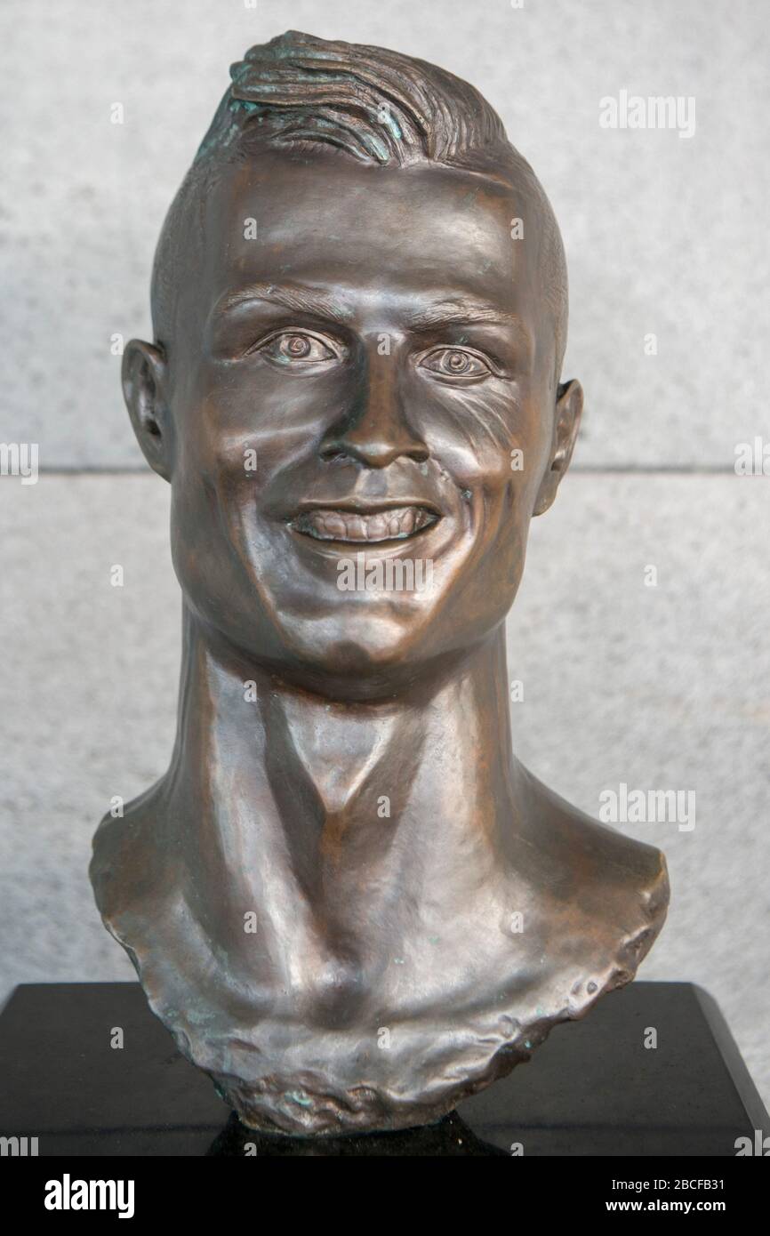 a statue of soccer player Cristiano Ronaldo of Portugal at the Airport ...
