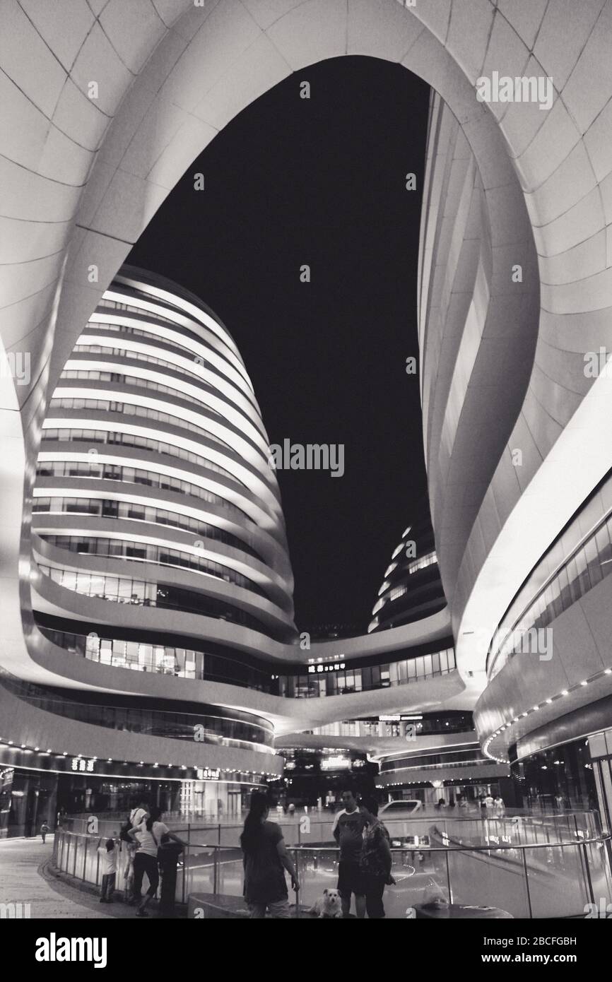 curve building at night in black and white Stock Photo - Alamy