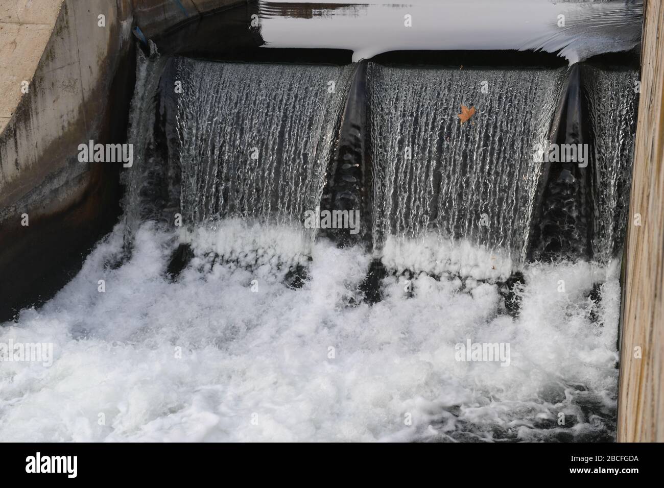Flowing water on a waste treatment plant Stock Photo - Alamy