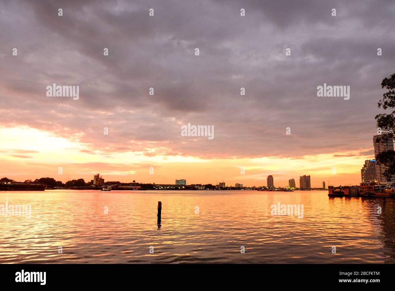 river with sky shading background Stock Photo - Alamy