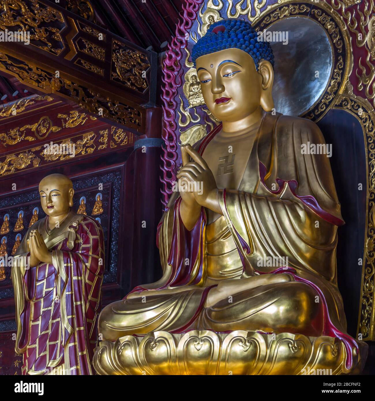 Gold coloured Buddha statue located in Giant Wild Goose Pagoda. Xi'an ...