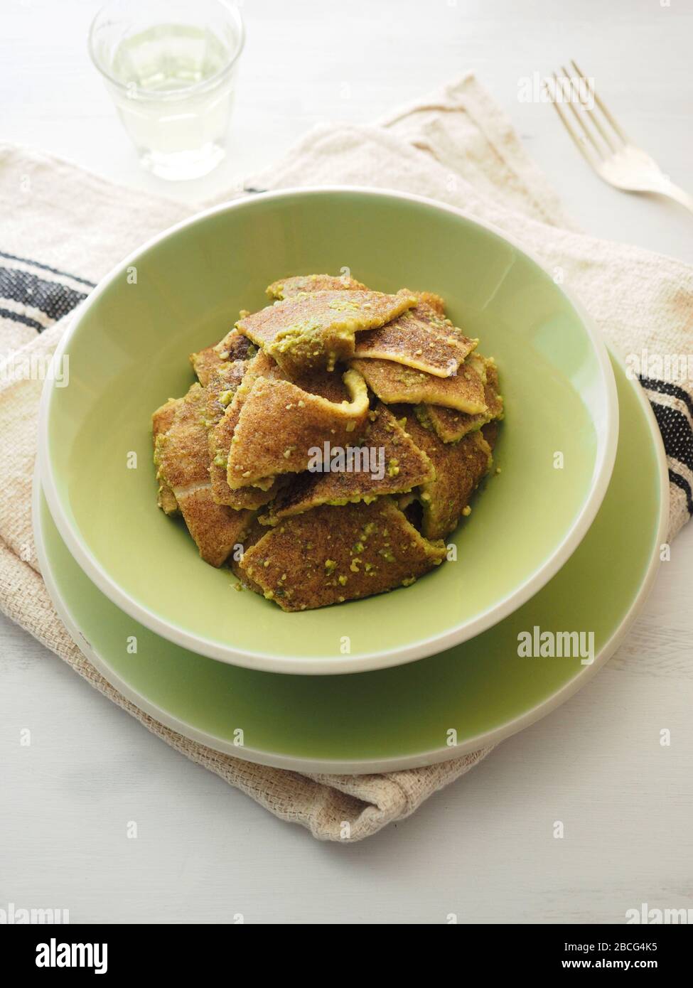 Testaroli al pesto souce, traditional ligurian pasta, Lunigiana, Ligury ...