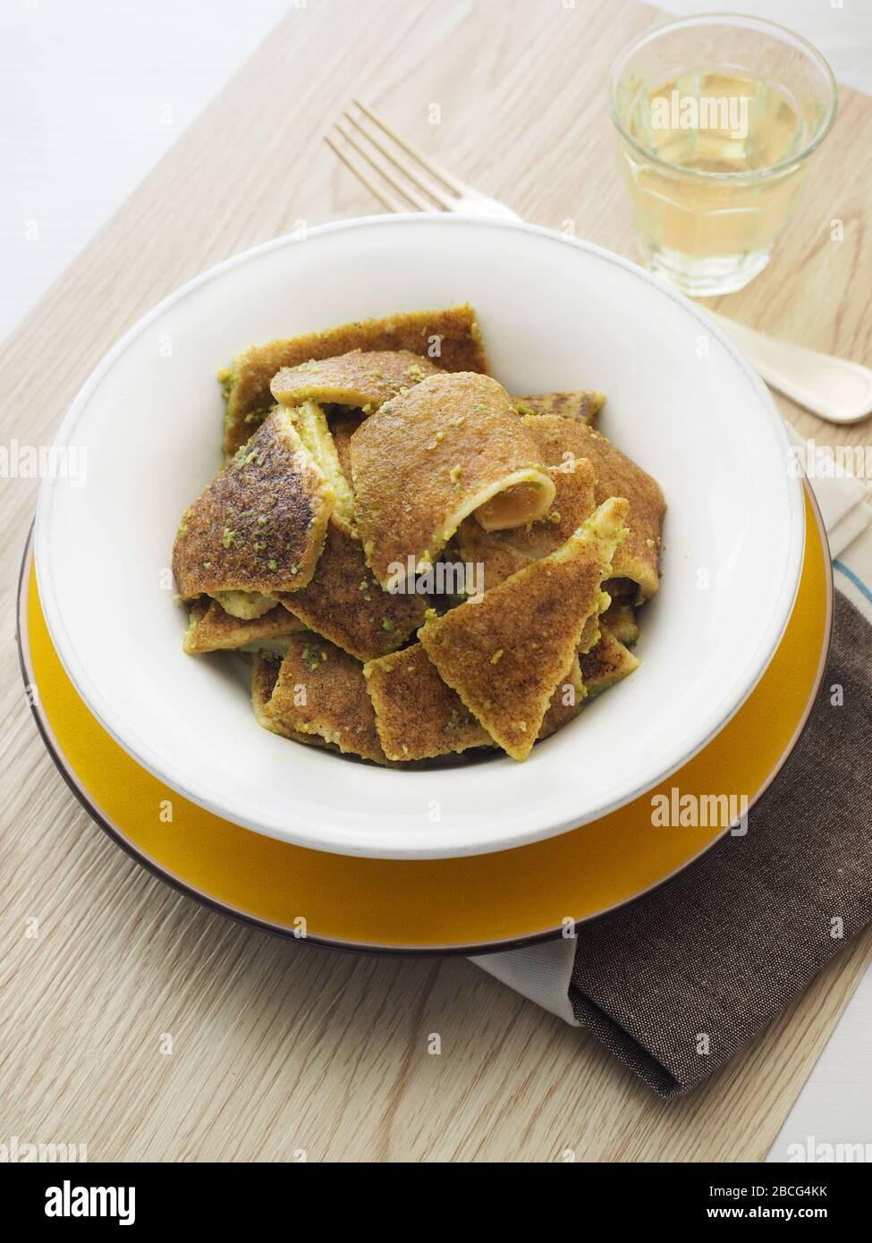 Testaroli al pesto souce, traditional ligurian pasta, Lunigiana, Ligury ...