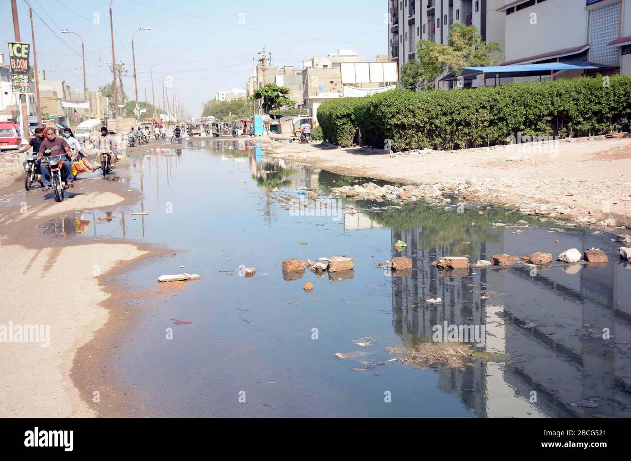 Inundated road by overflowing sewerage water creating problems for ...