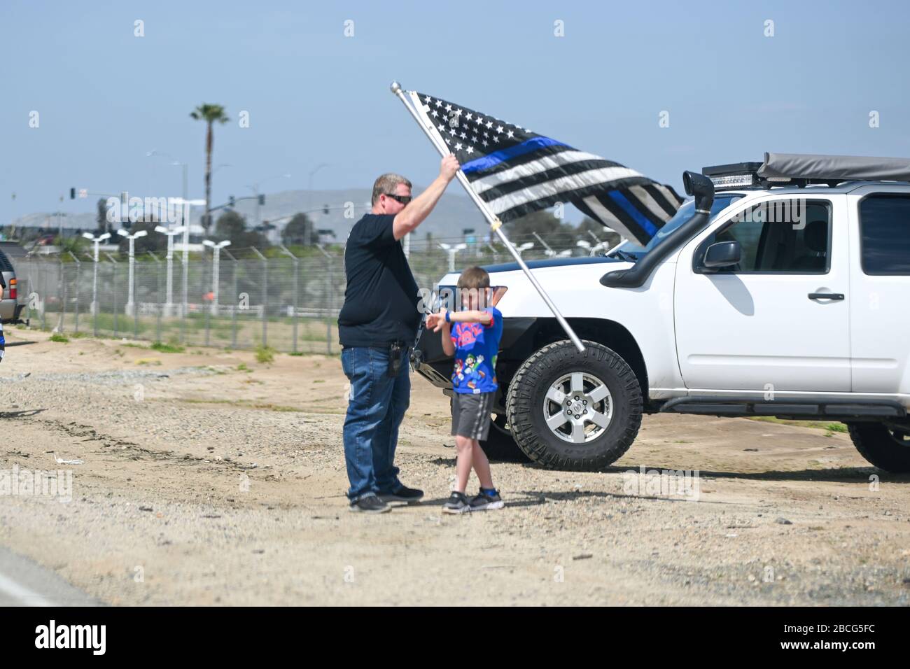 Riverside, California, USA. 3rd Apr 2020. People pay honor to the ...