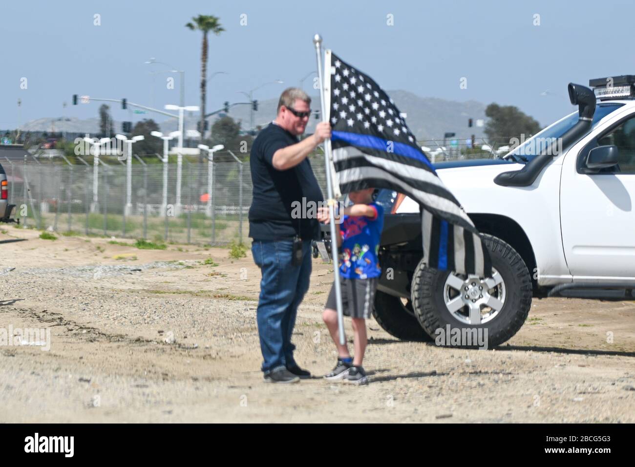 Riverside, California, USA. 3rd Apr 2020. People pay honor to the ...
