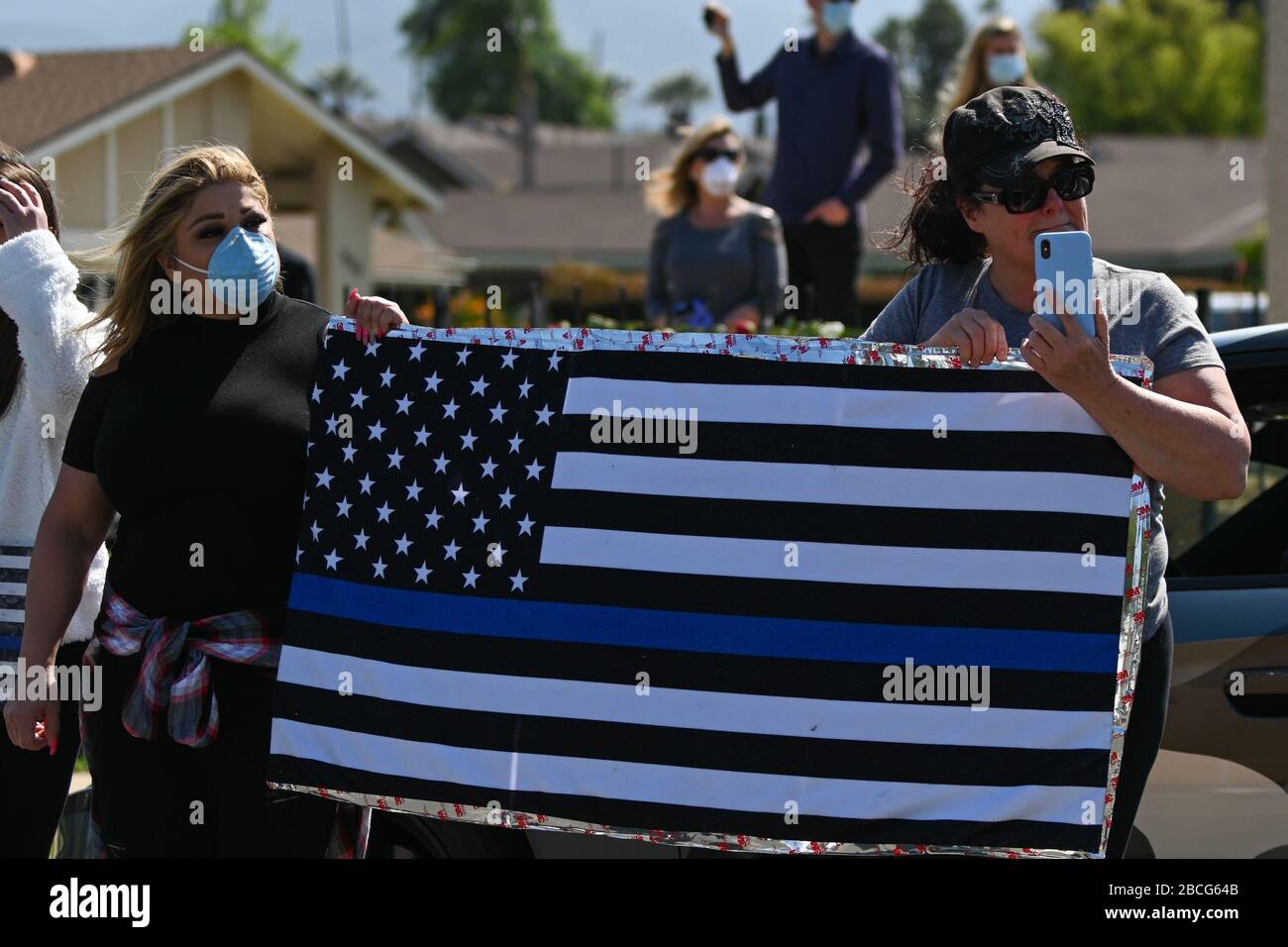 Riverside, California, USA. 3rd Apr 2020. People pay honor to the ...