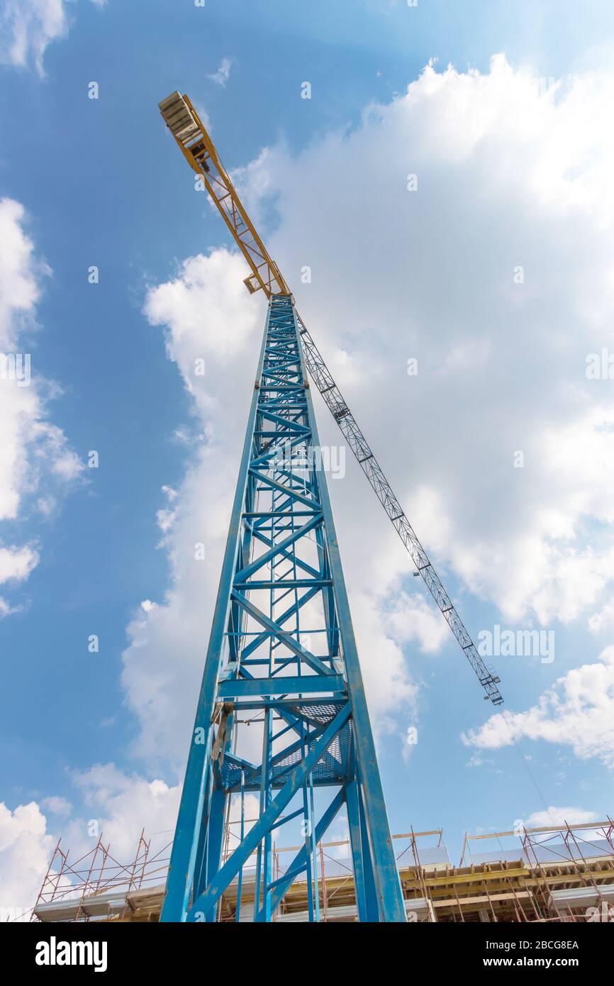 Rise building with cranes under construction. Building construction ...