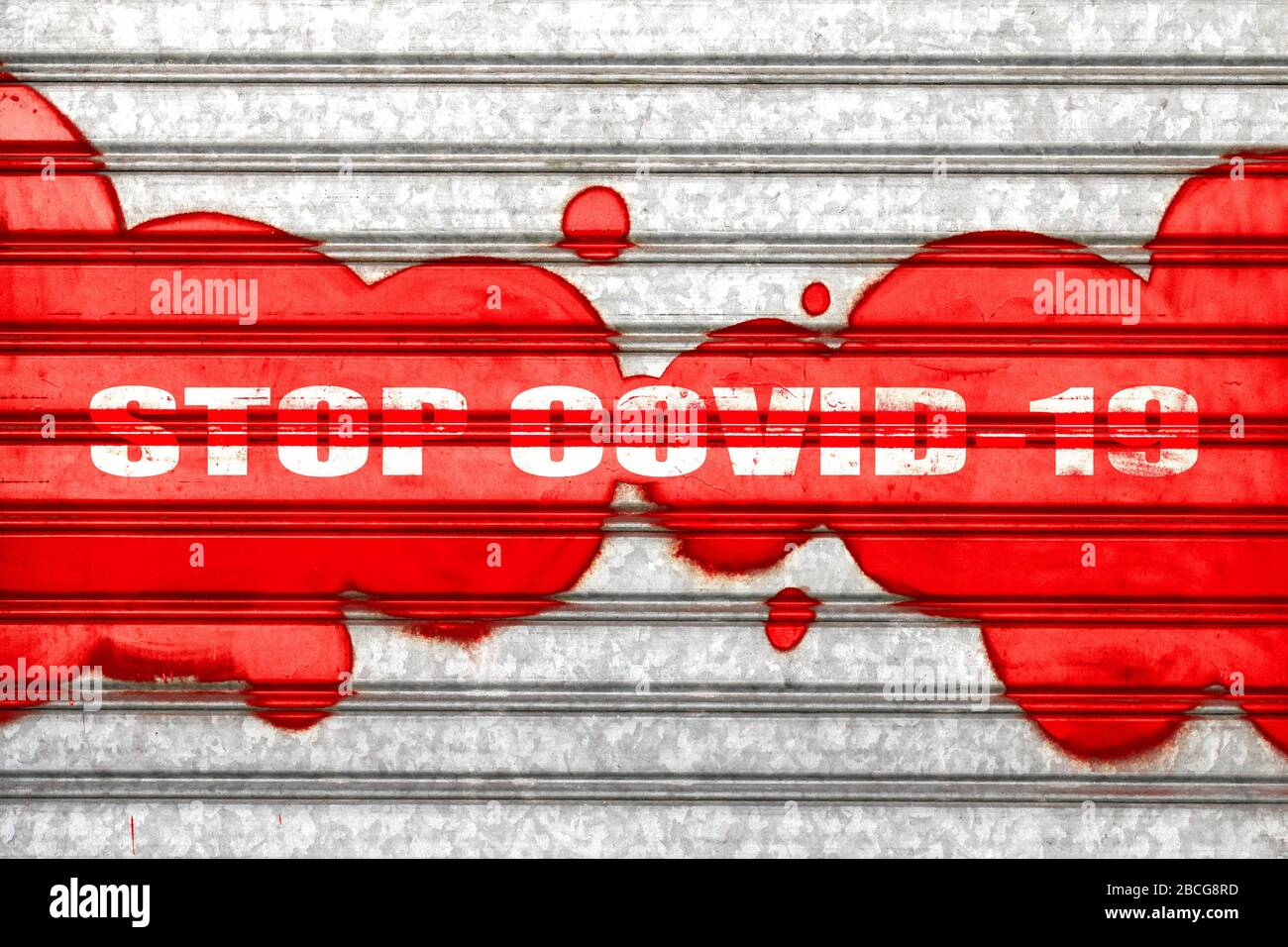 Warning sign for Covid-19 in front of closed shop/store. Lockdown ...