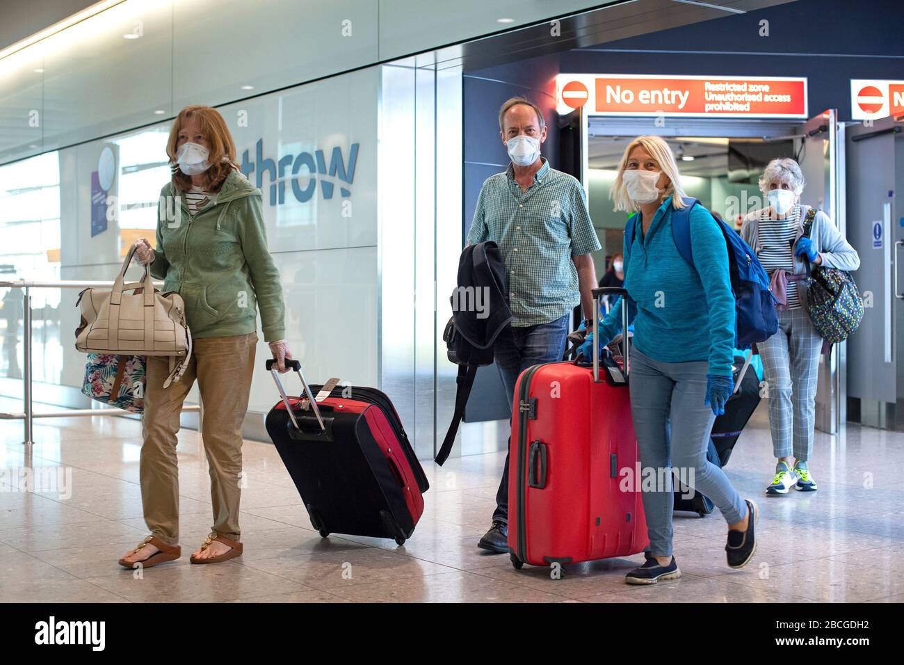 Passengers from the Holland America Line ship Zaandam walk through ...