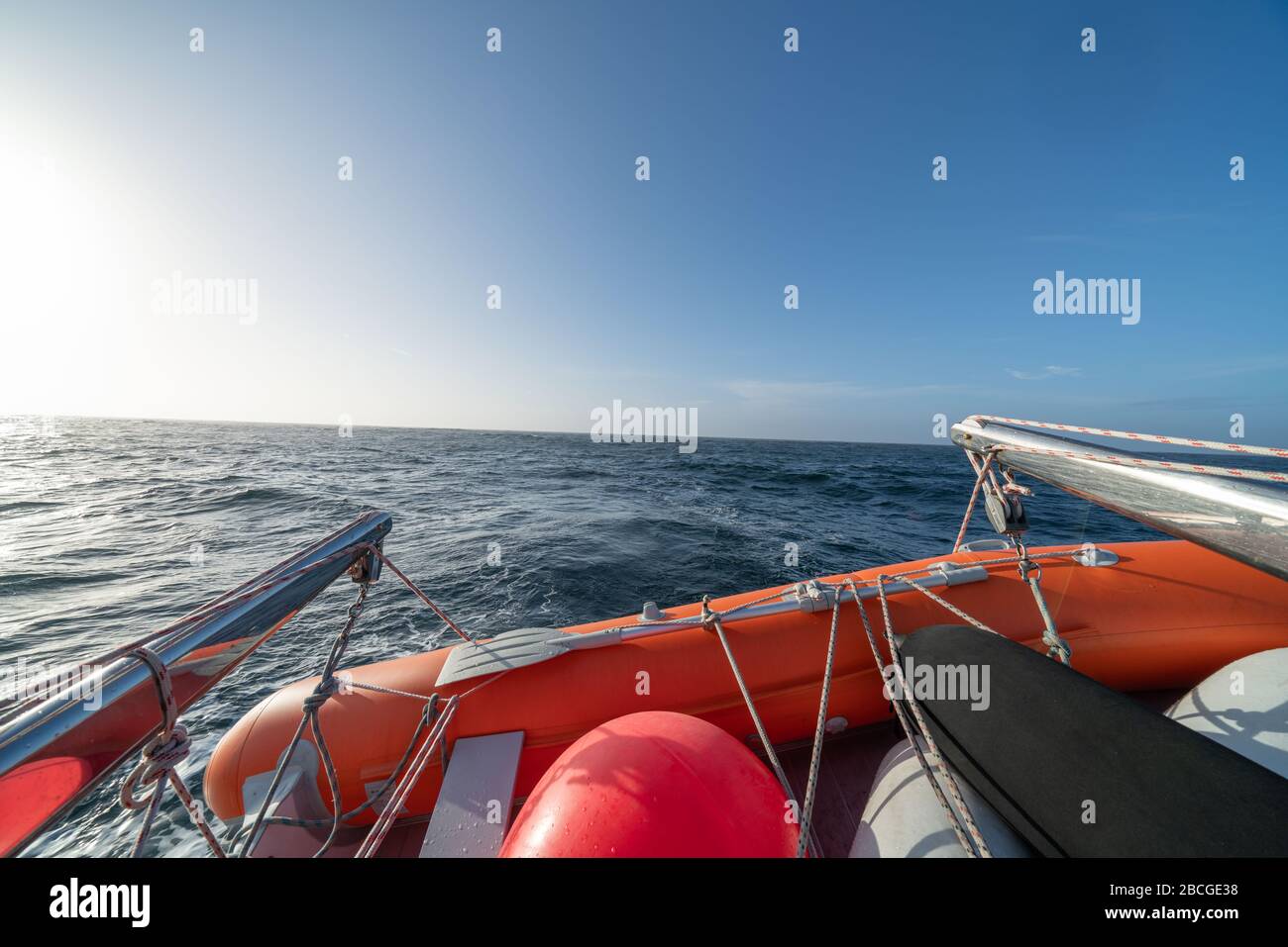 sailing boat in Antarctica, yacht navigation through icebergs and sea ...