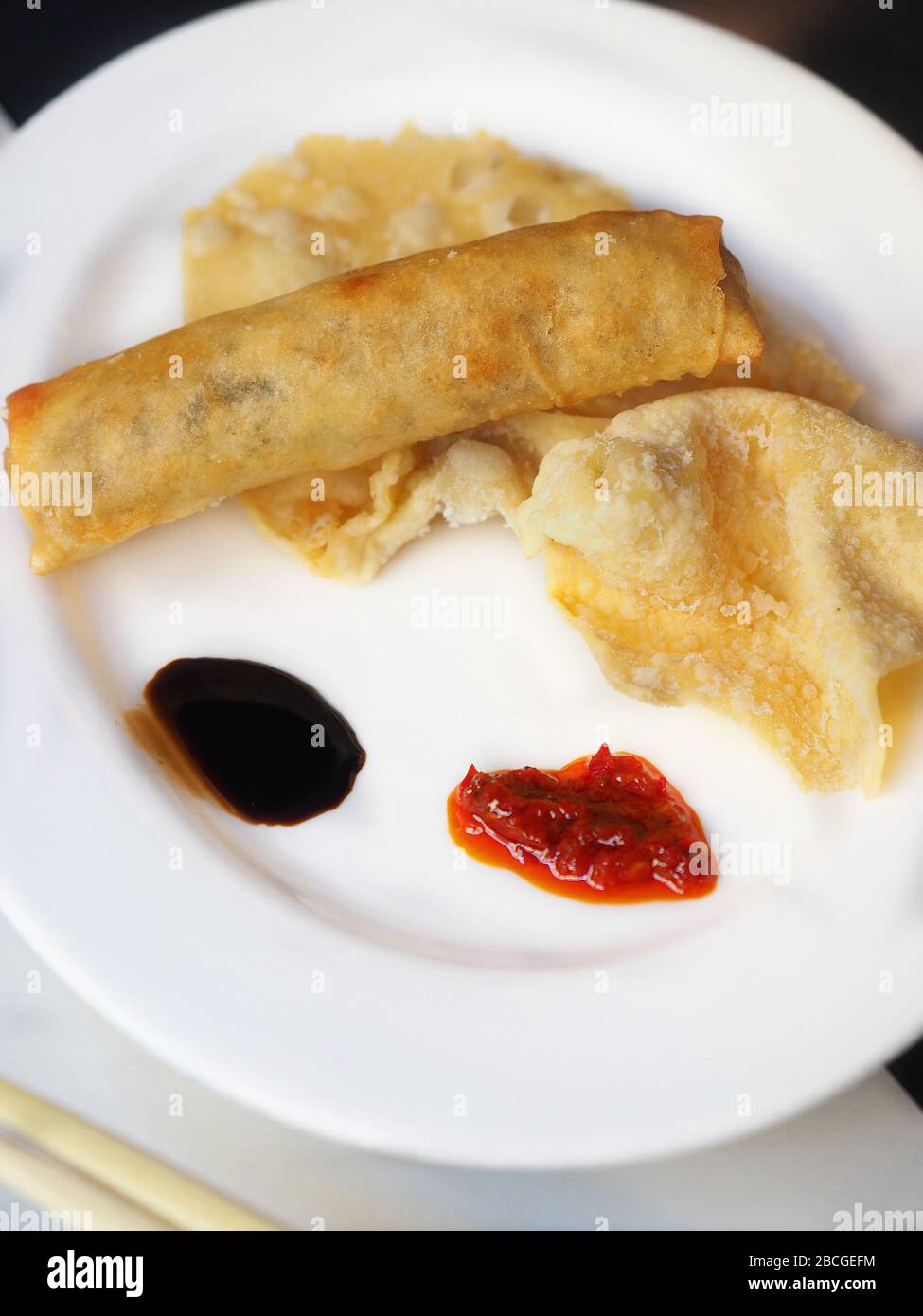 Chinese spring rolls and wonton, Lombardy, Italy, Europe Stock Photo ...