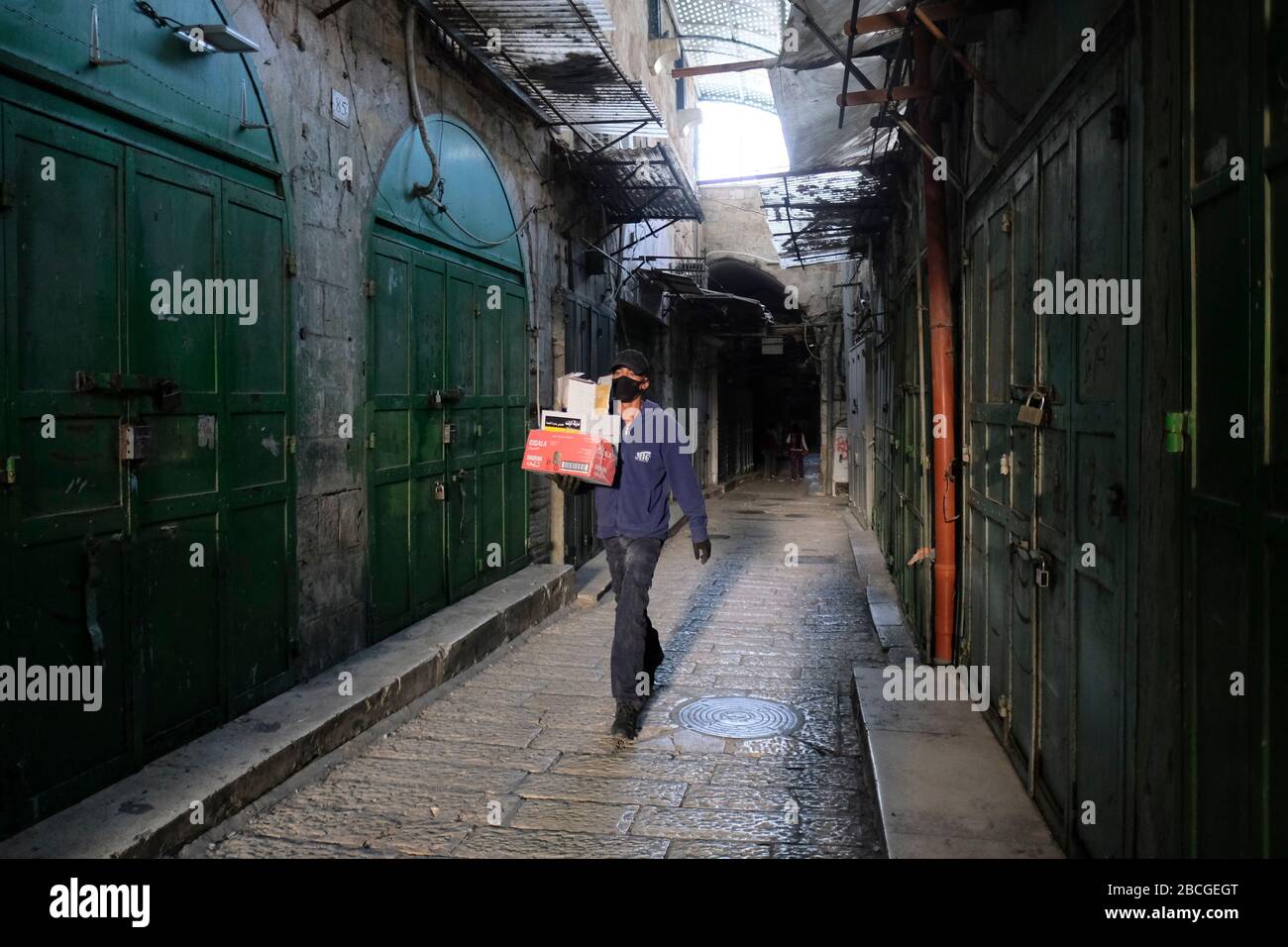 Worker walks past old hi-res stock photography and images - Alamy