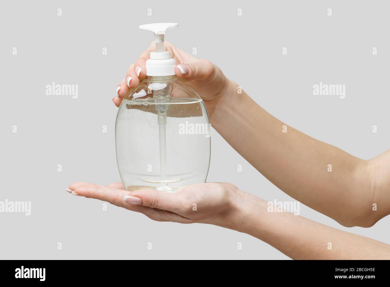 Woman liquid cleaner dispenser hi-res stock photography and images - Alamy