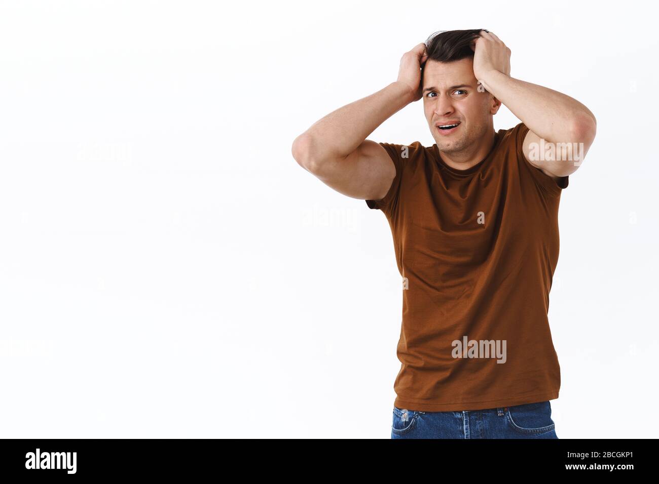 Oh no what have I done. Portrait of adult man in panic, grab head and ...