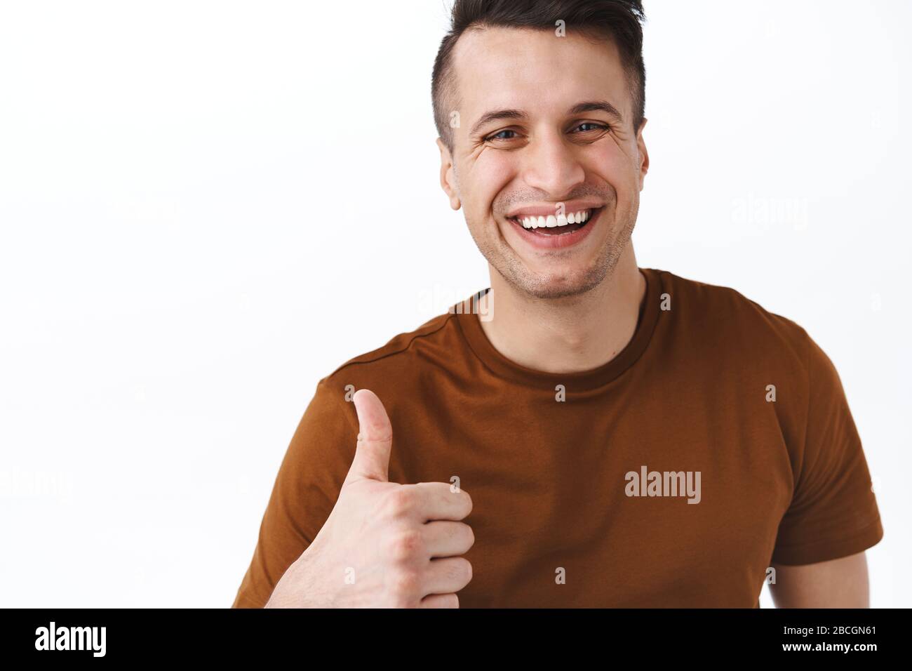 Very good, definitely recommend. Handsome cheerful, smiling adult man ...