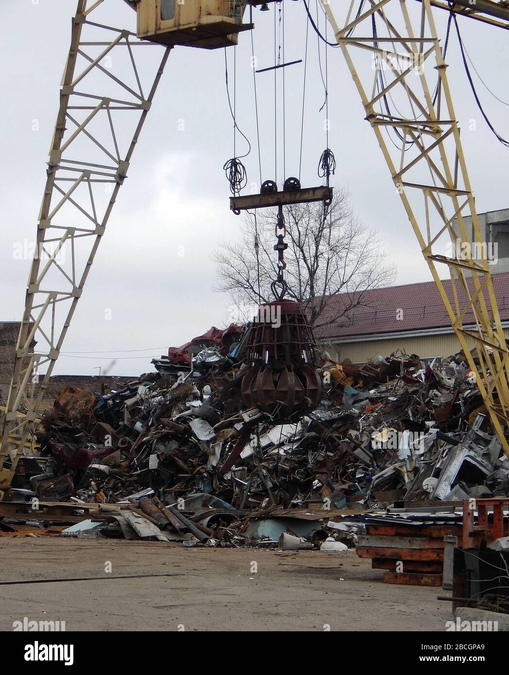 Grabber Crane Machine Loading Rusty Metal Scrap On The Scrapyard Stock ...
