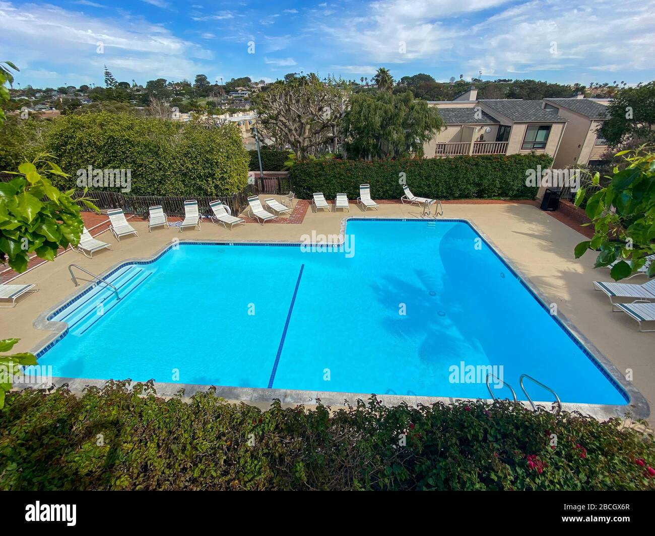 Community swimming pool and jacuzzi inside typical private condo ...