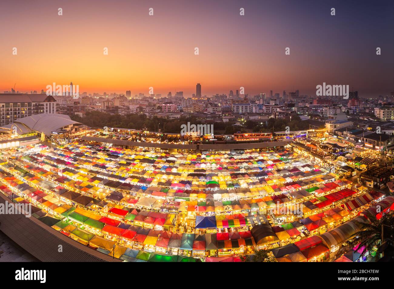 Ratchada Night market in Bangkok during sunset Stock Photo - Alamy