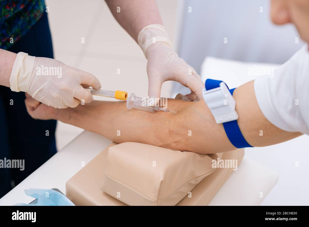 Nurse drawing blood sample from arm for blood test, close-up Stock ...