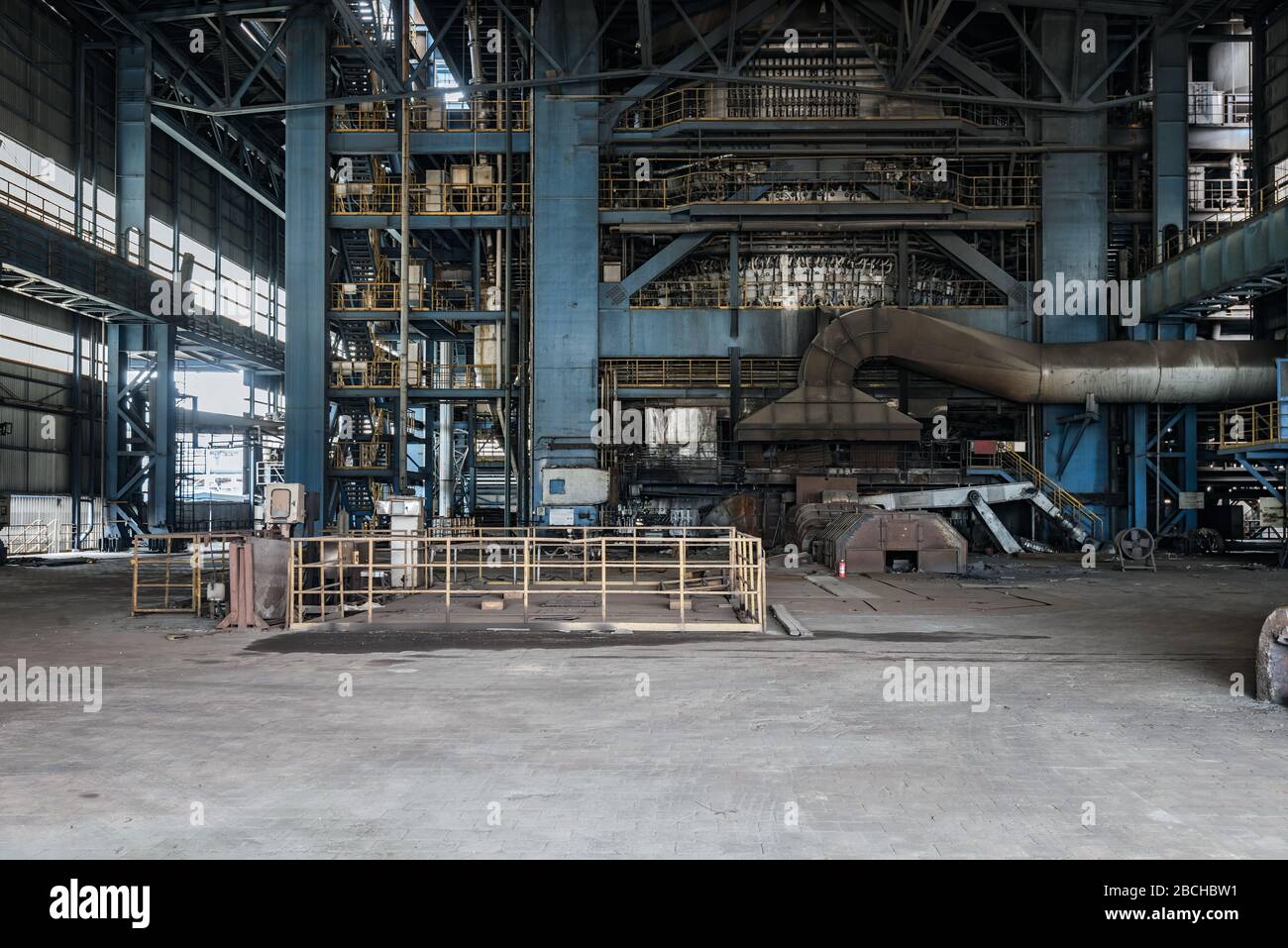 Interior of an old abandoned industrial steel factory Stock Photo - Alamy
