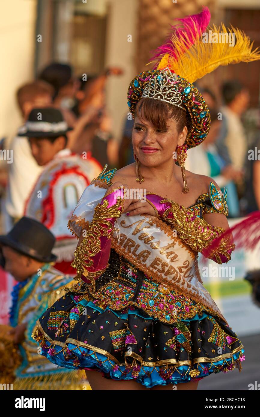 Morenada dancer performing during a street parade at the annual ...