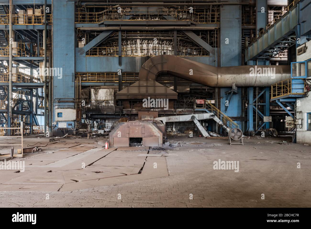 Interior of an old abandoned industrial steel factory Stock Photo - Alamy
