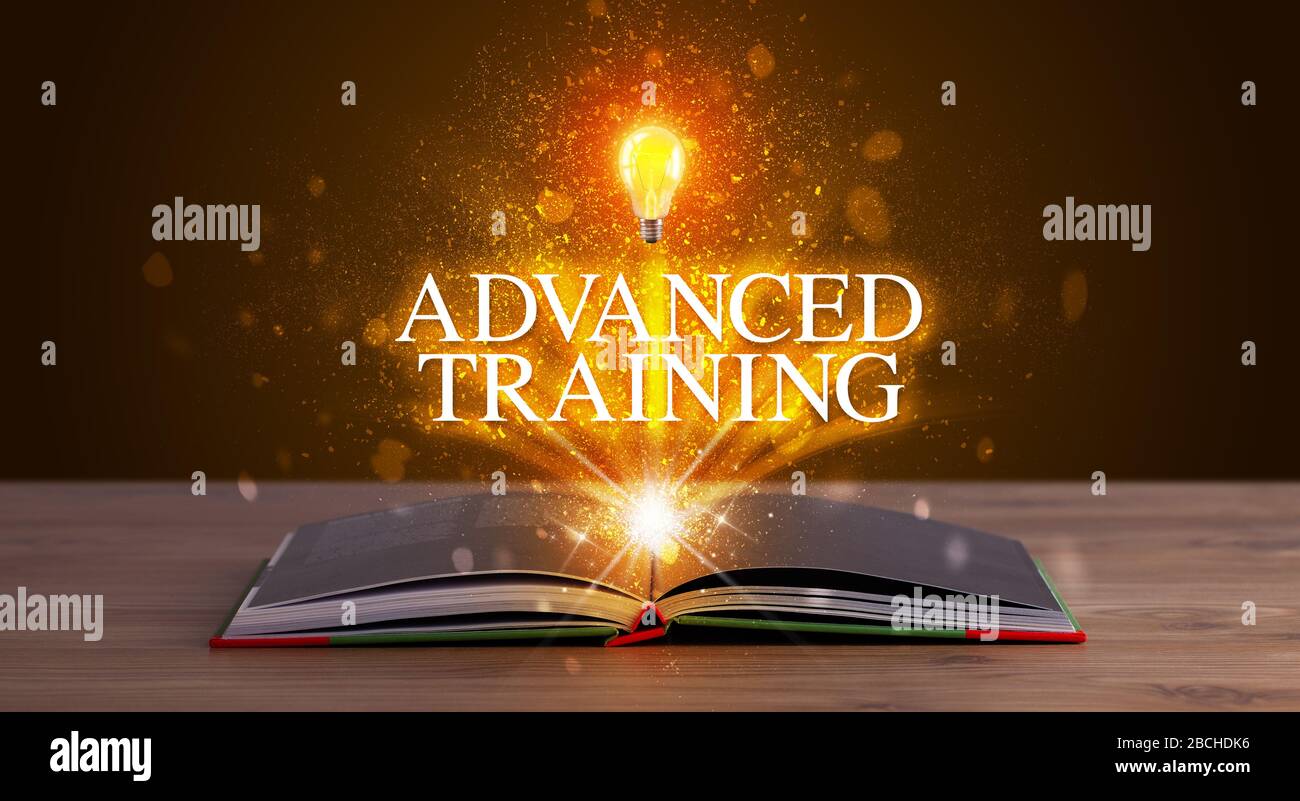 ADVANCED TRAINING inscription coming out from an open book, educational ...