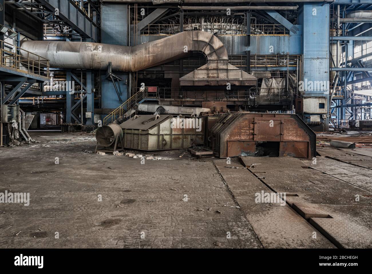 Interior of an old abandoned industrial steel factory Stock Photo - Alamy