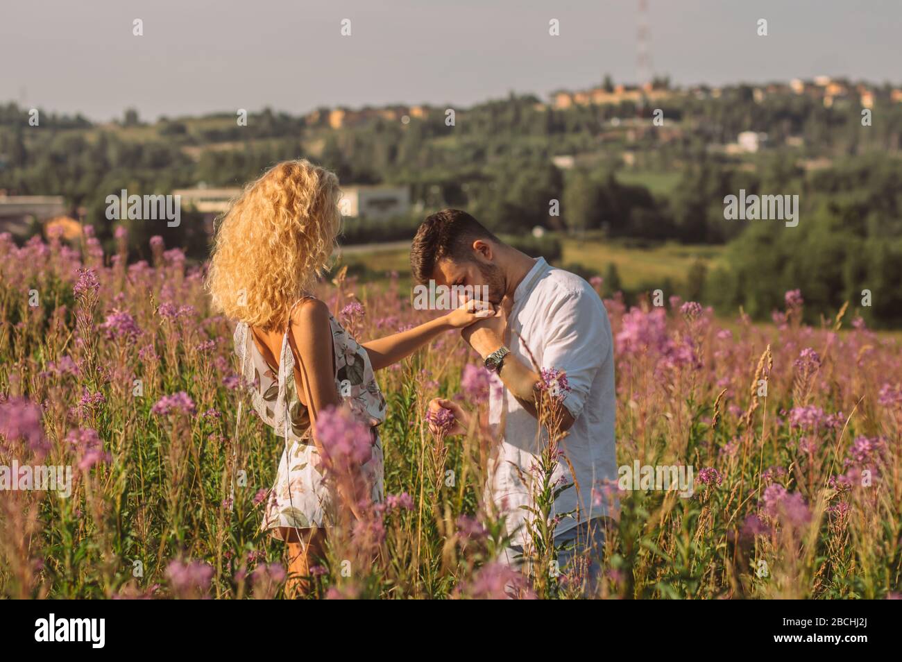 Man kissing hand hi-res stock photography and images - Alamy