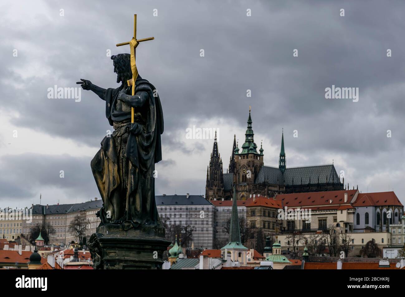 Statue of John the Baptist and St Vitus Cathedral, Prague Stock Photo ...