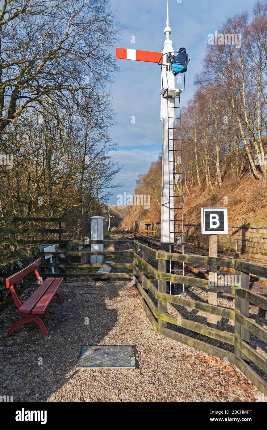 Old traditional railway signal at a points junction in the countryside ...
