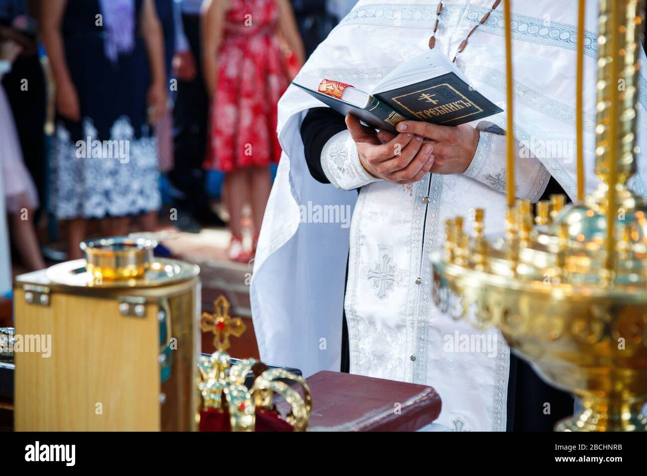 Orthodox religion. Hands of the priest on the bible Stock Photo - Alamy