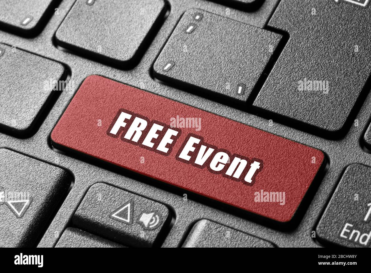 free event pc keyboard button pushing a single word Stock Photo - Alamy