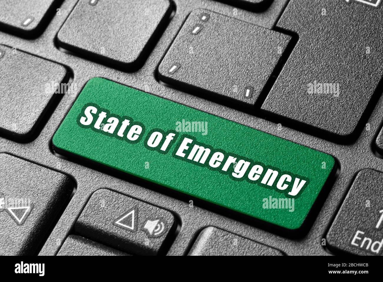 state of emergency pc keyboard button pushing a single word Stock Photo ...
