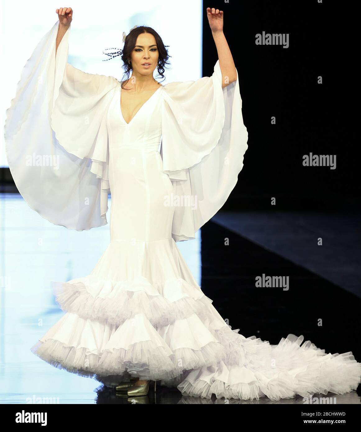 SEVILLA, SPAIN - JAN 30: model Maria Ramos Rivas wearing a white dress ...