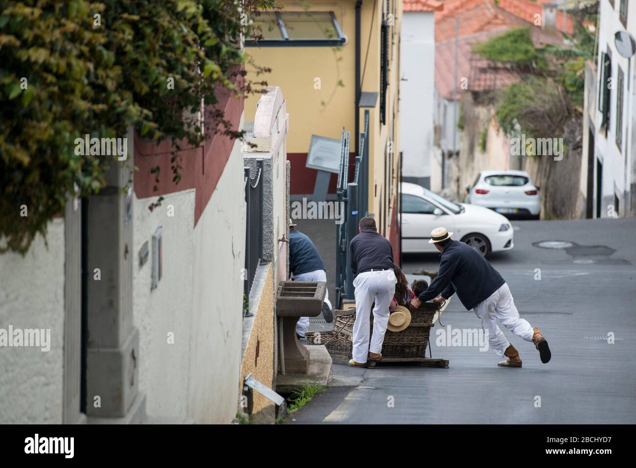 a traditional Monte sledge on the way from Monte to Funchal the city ...