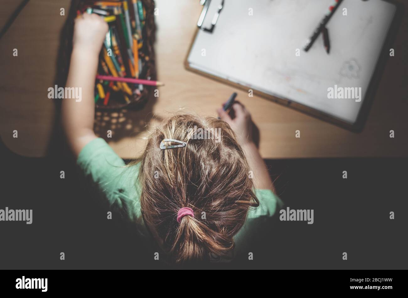 Child drawing whit color pencil Stock Photo - Alamy
