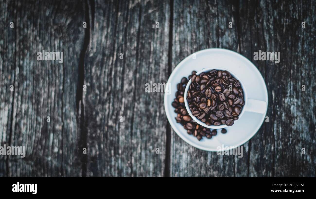 Coffee beams in white cup Stock Photo - Alamy