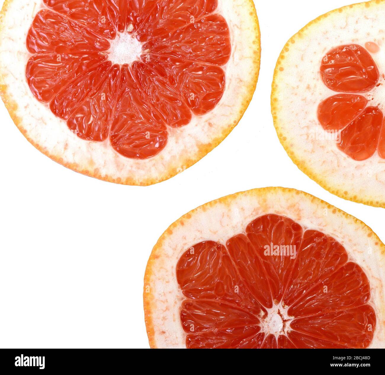 Slices of red grapefruit isolated on white background Stock Photo - Alamy